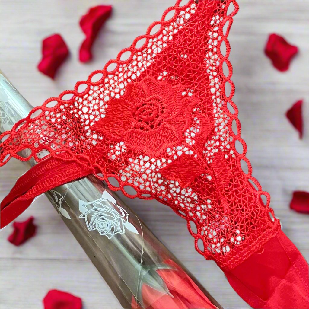 Red lace g string brief wrapped to look like a single red Rose ...