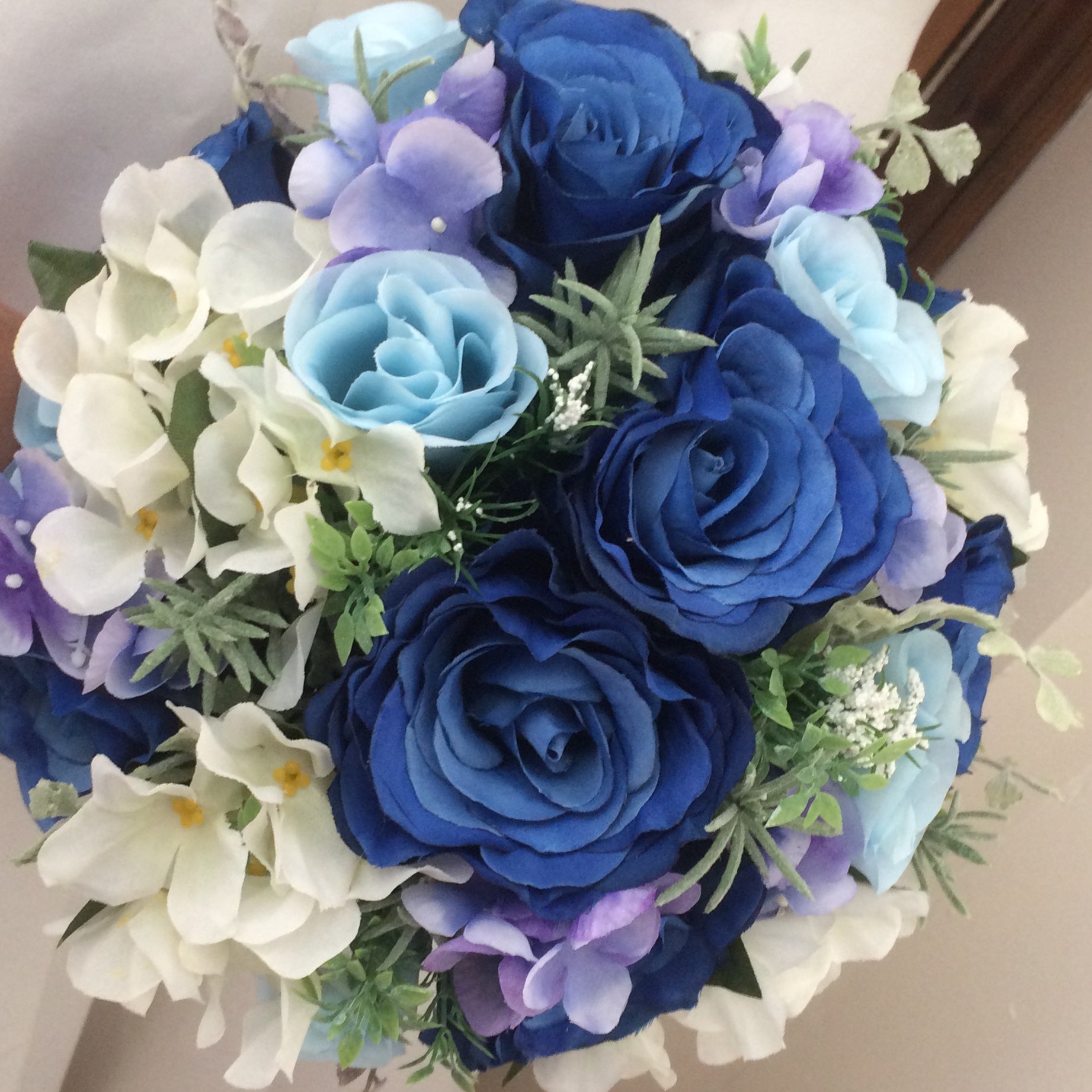 A wedding bouquet collection of artificial blue roses & hydrangea ...