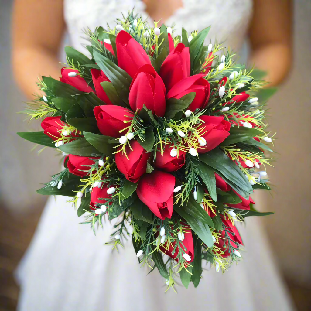 a wired cascade type bouquet featuring red silk tulips plus foliage ...